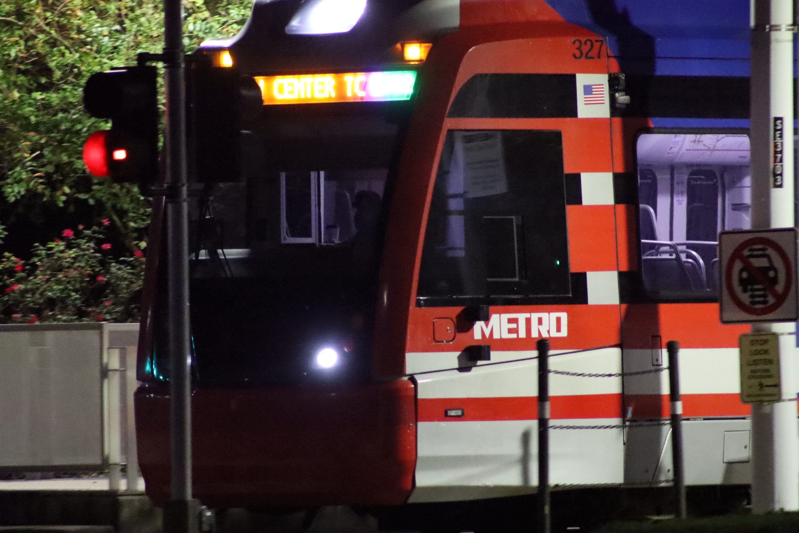 Photo of Metro Light Rail at Night - Rideshare Houston